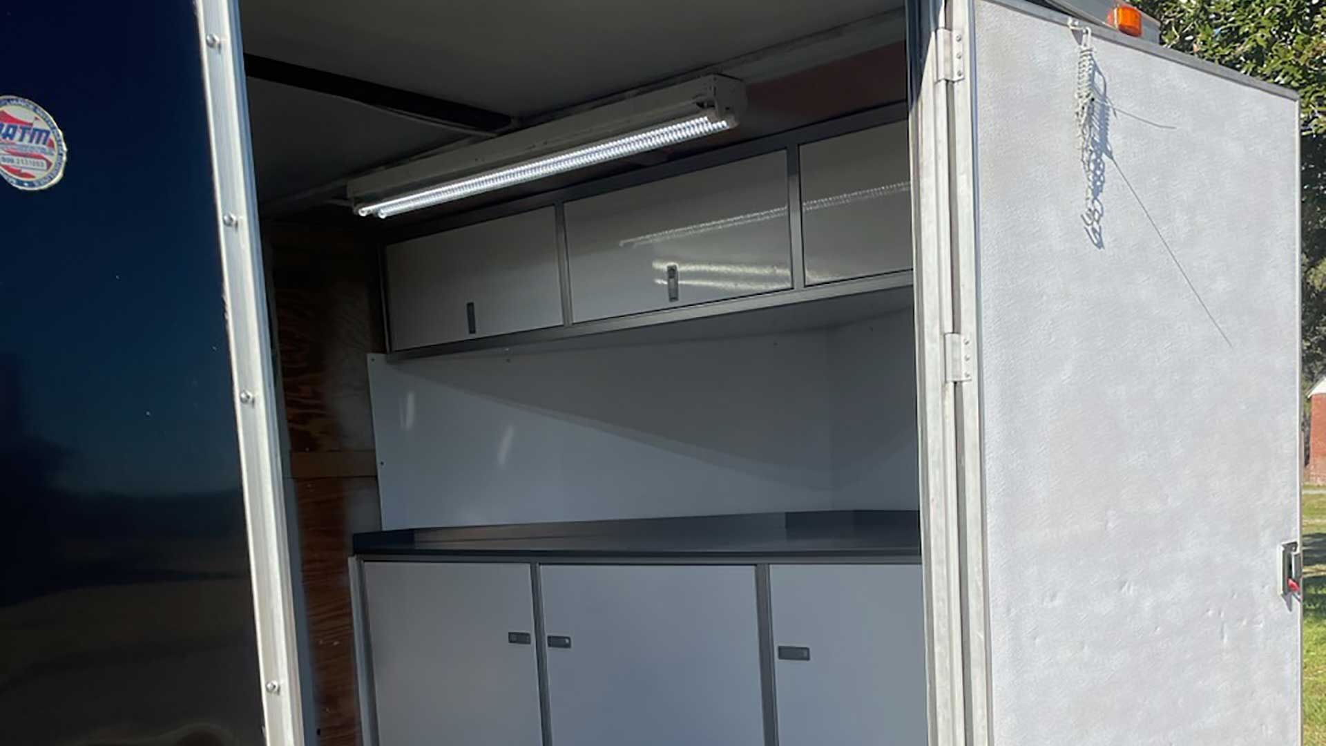 A Winning Combo: V-Nose Trailer Aluminum Cabinets Improve Father ...
